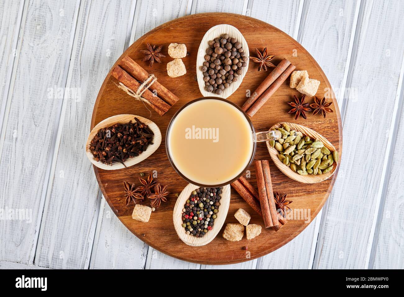 Traditional Indian drink - masala tea with spices. Cinnamon, cardamom ...