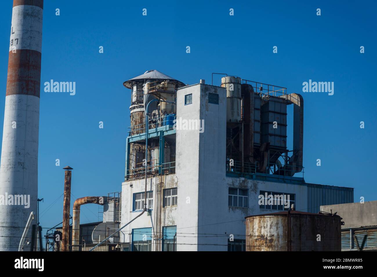Industrial chimney and factory in the outskirts of Havana, Cuba Stock ...