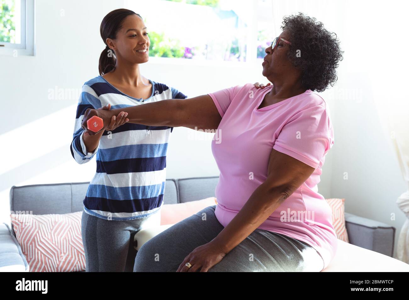 Senior African American woman at home during quarantine lock down for ...
