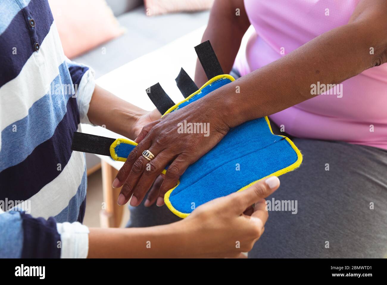 Senior African American woman at home during quarantine lock down for ...