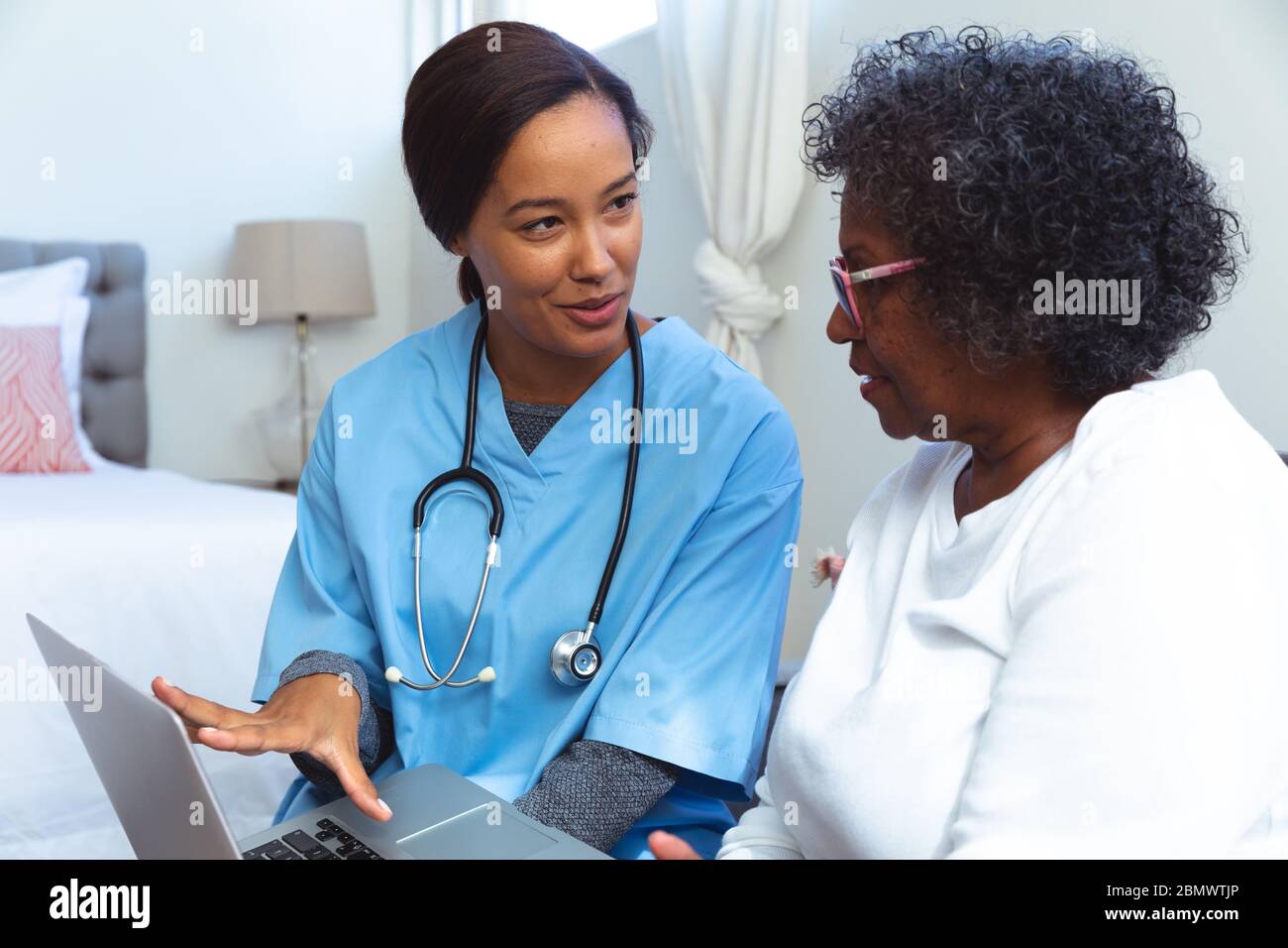 African American women at home during quarantine lock down for ...