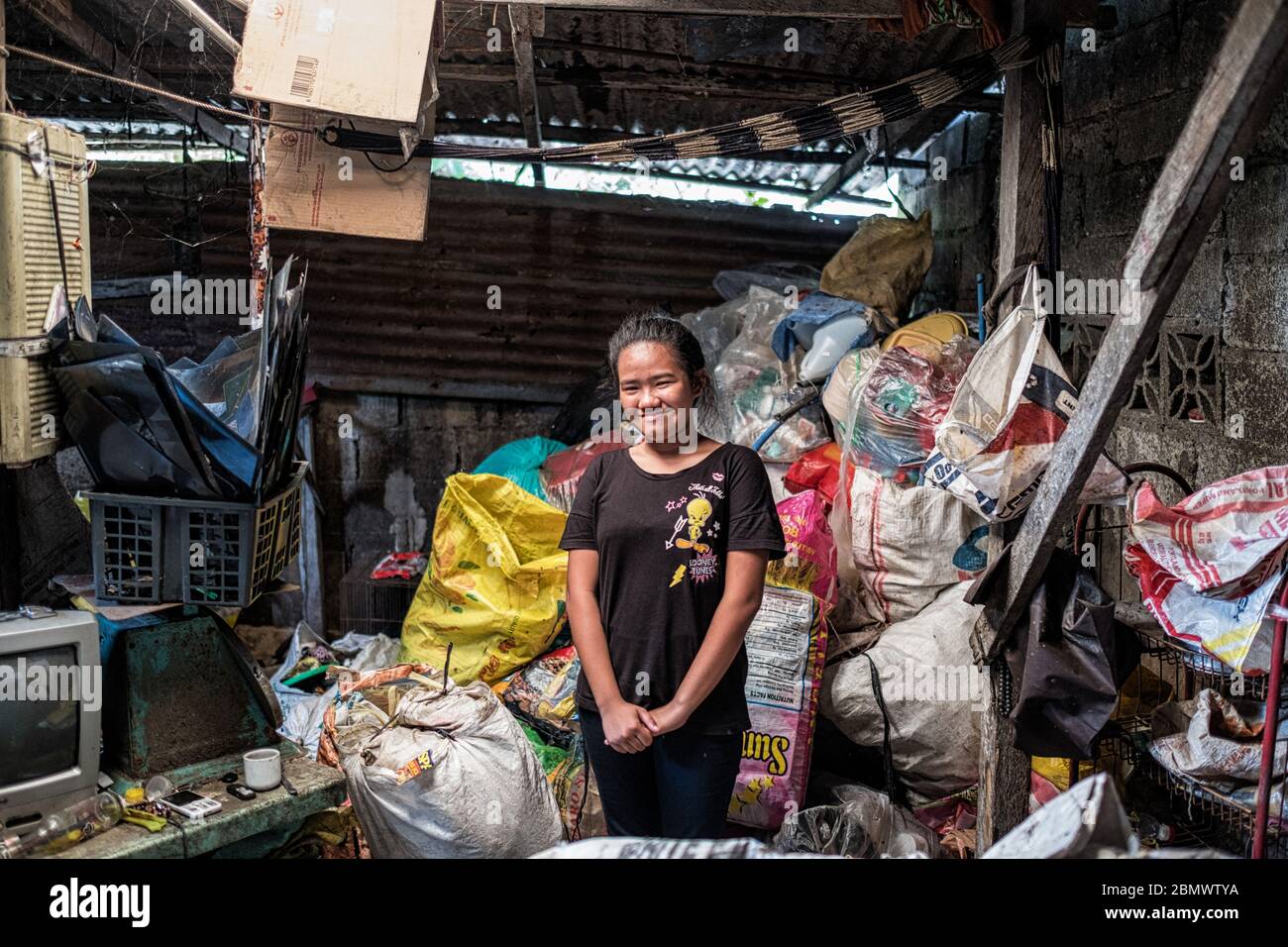 Payatas, lining in the garbage (Manila, Philippines) color version ...