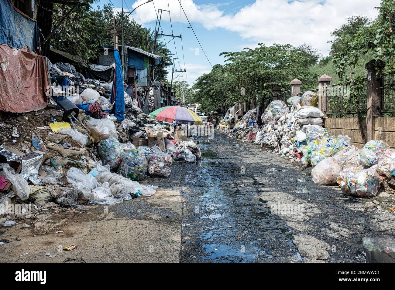 Payatas, lining in the garbage (Manila, Philippines) color version ...