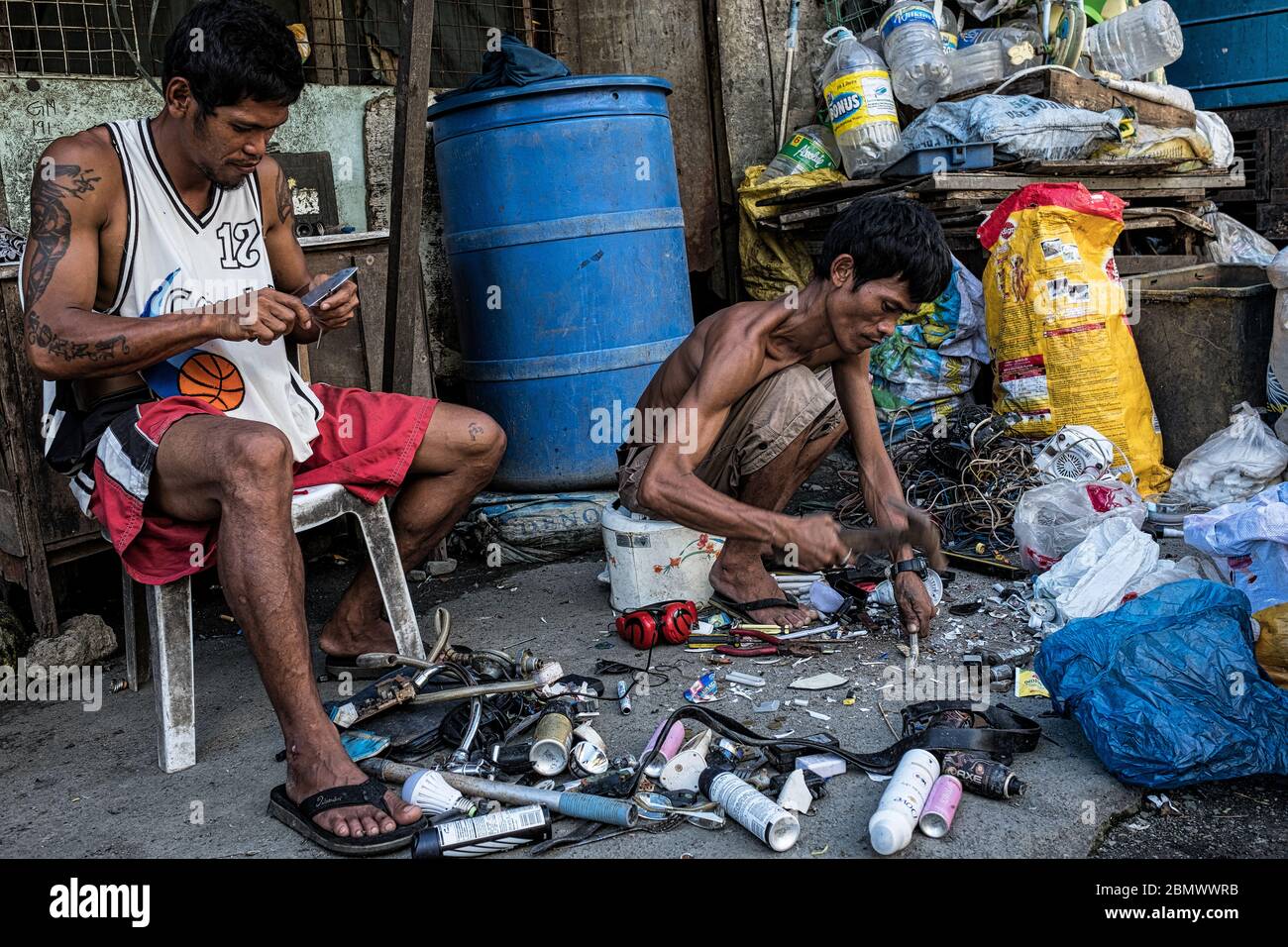 Payatas, lining in the garbage (Manila, Philippines) color version ...