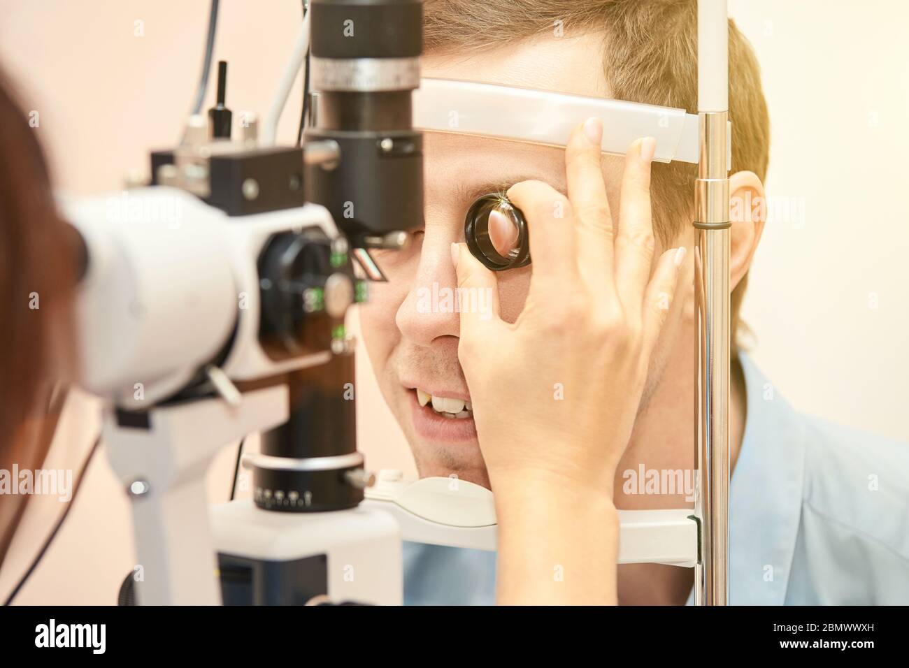Eye doctor diagnostic. Patient at medical clinic Stock Photo - Alamy