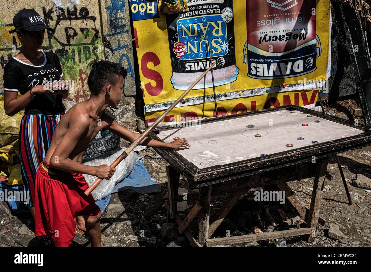 Payatas, lining in the garbage (Manila, Philippines) color version ...