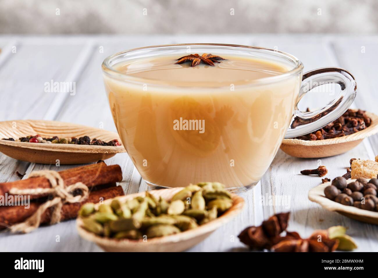 Traditional Indian drink - masala tea with spices. Cinnamon, cardamom ...