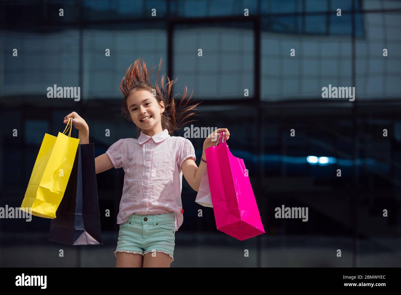 Sale, consumerism: Child little girl young shopaholic with shopping ...