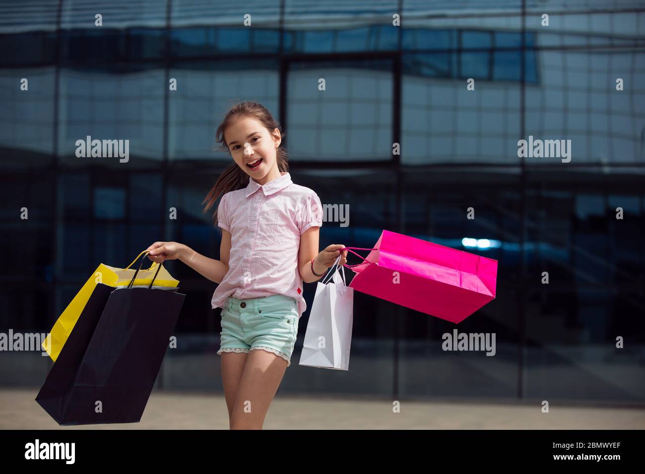 Sale, consumerism: Child little girl young shopaholic with shopping ...