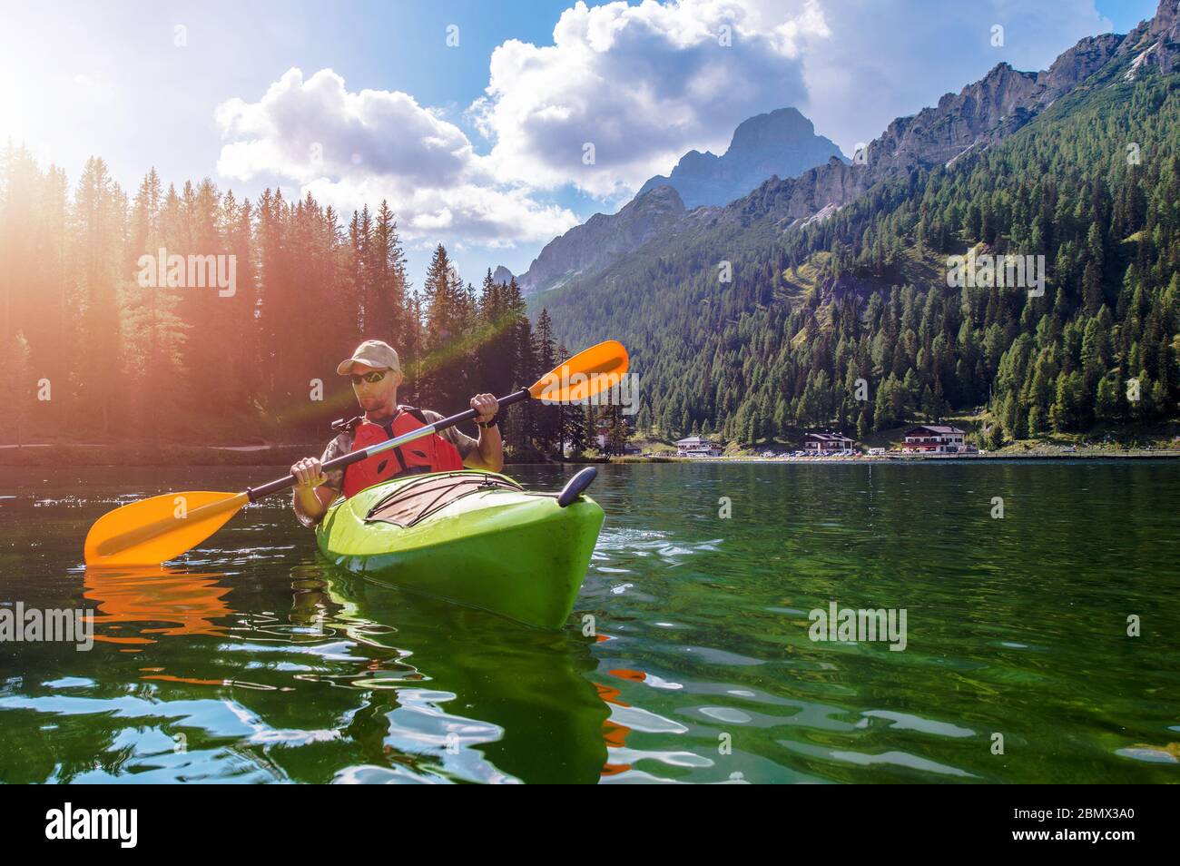Caucasian Male Kayaking In Scenic Misurina Lake In Italy Stock Photo ...