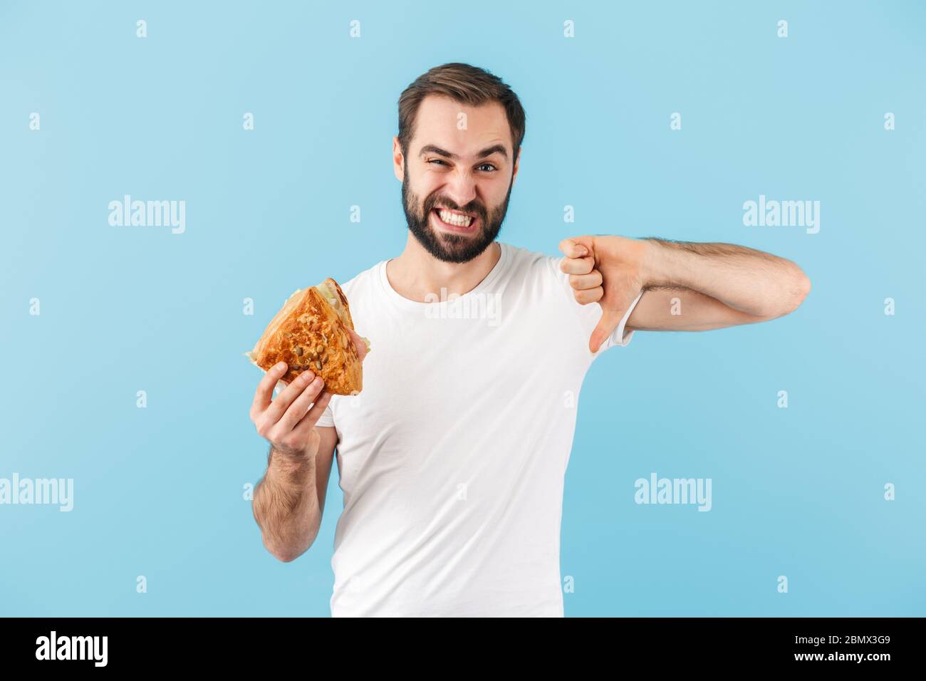 Fat man eating a pizza hi-res stock photography and images - Alamy