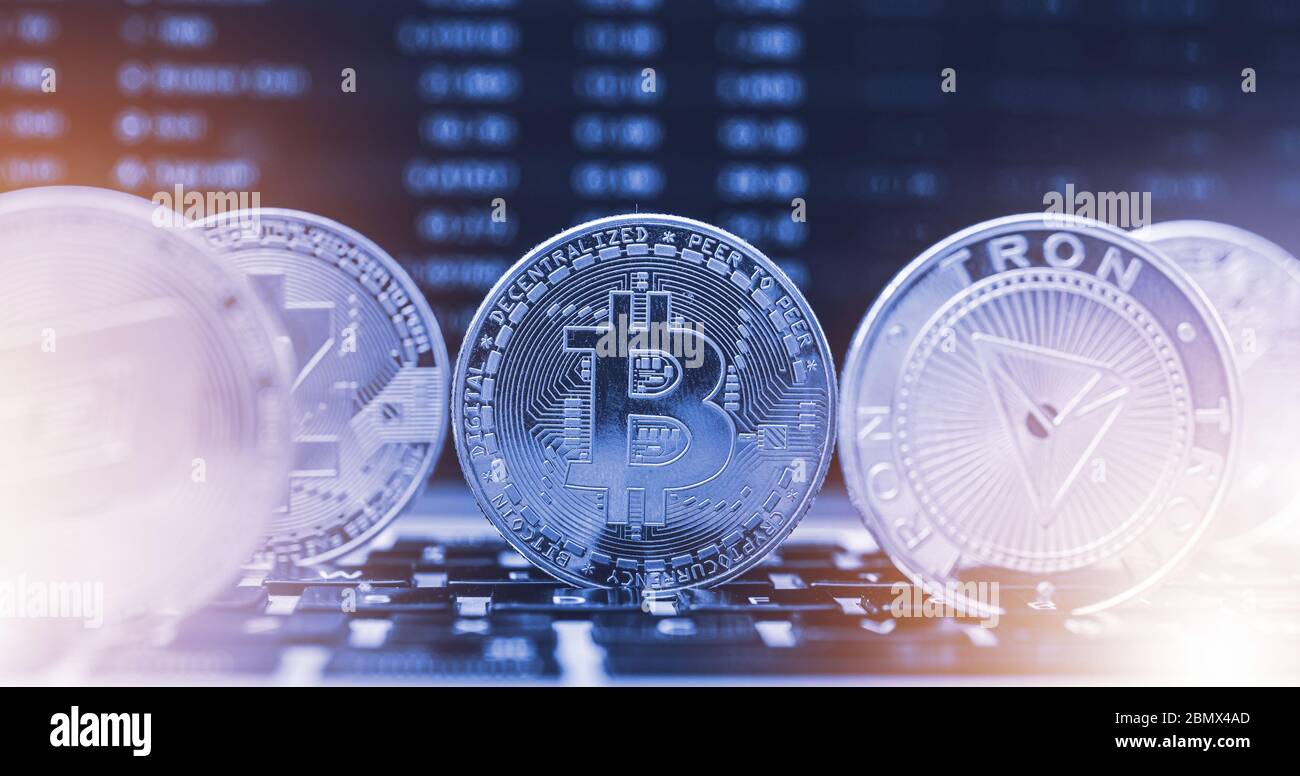 Crypto Currency Silver Coins On Computer Keyboard With Stock Market ...