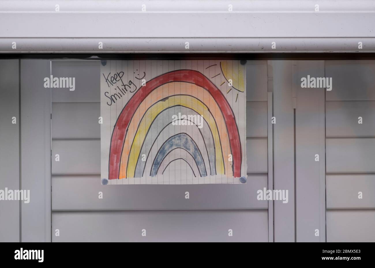 Wimbledon, London, UK. 11 May 2020. Childrens painting of rainbow ...