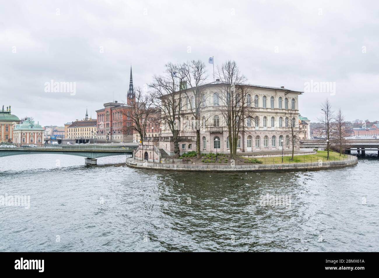 Beautiful buildings at the bank of the strait and islands in the ...