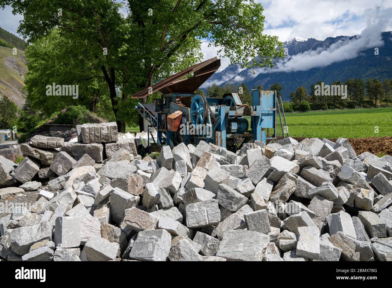 cut stones and blocks with an old rock cutting machine in the ...