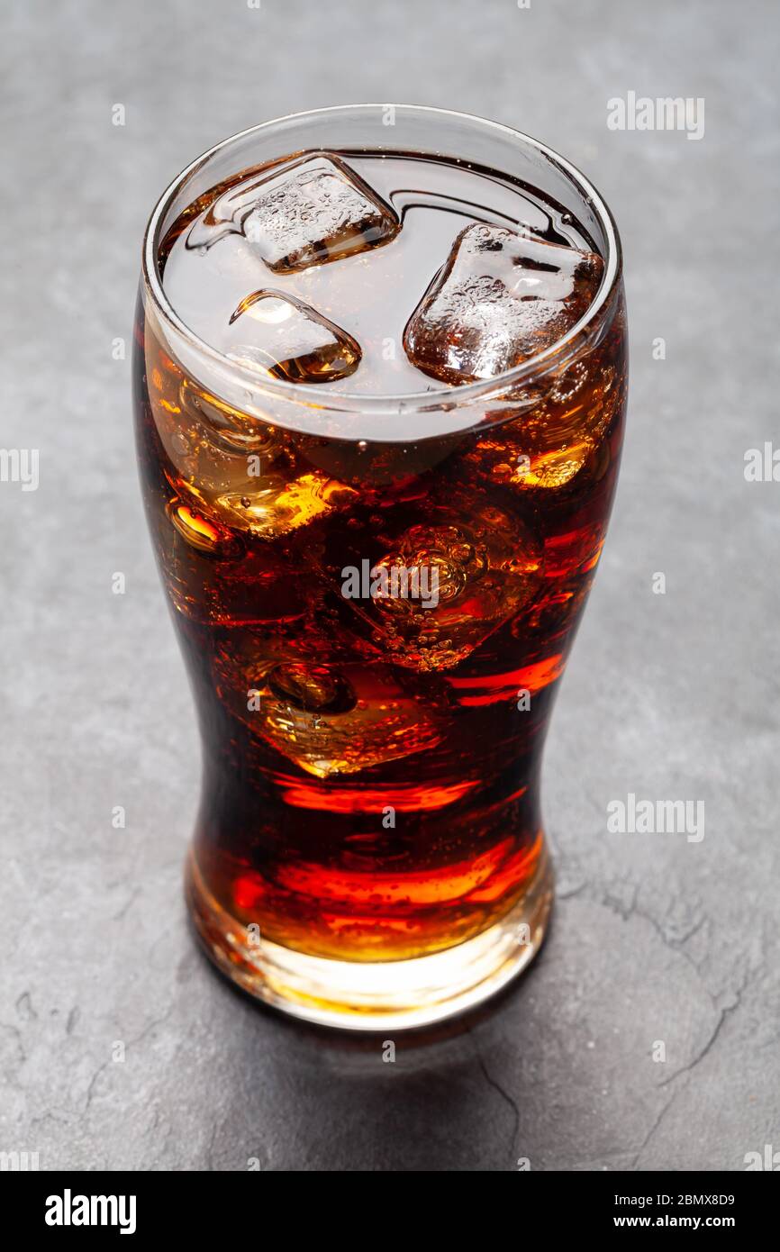 Class of cola with ice cubes. Take away food Stock Photo - Alamy