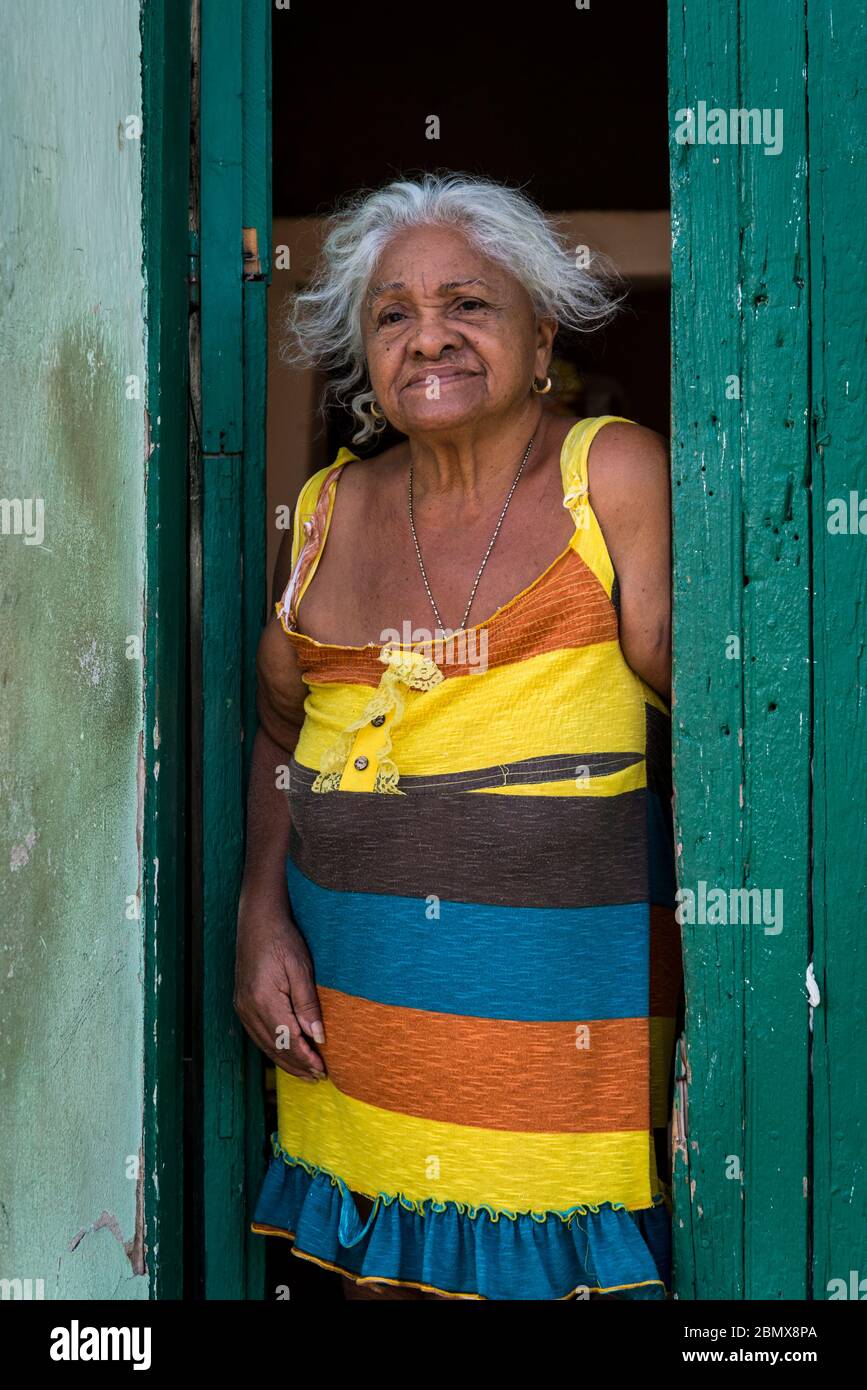Old cuban woman standing outside her house hi-res stock photography and ...