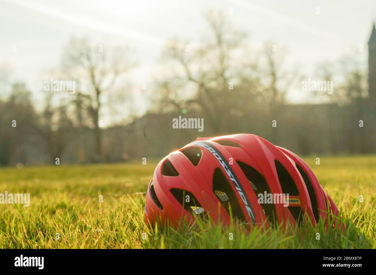 Red bicycle helmet hi-res stock photography and images - Alamy