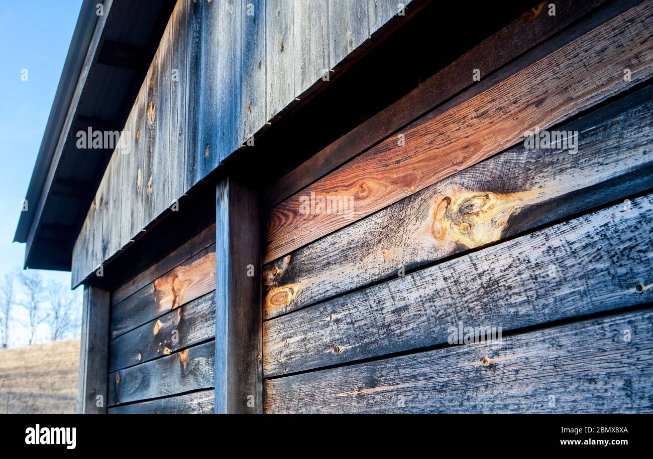 Weathered unpainted wooden planks of a barn in Lindsay-Parsons ...