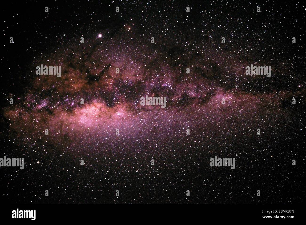purple milky way galaxy in very dark Namibian sky Stock Photo - Alamy