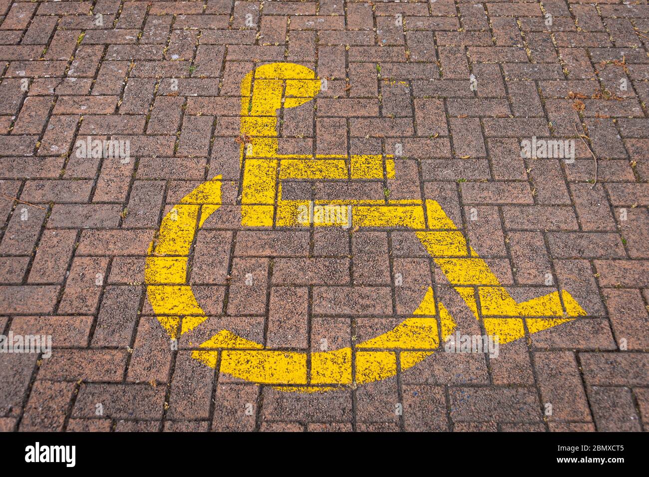 painted disabled parking bay Stock Photo - Alamy