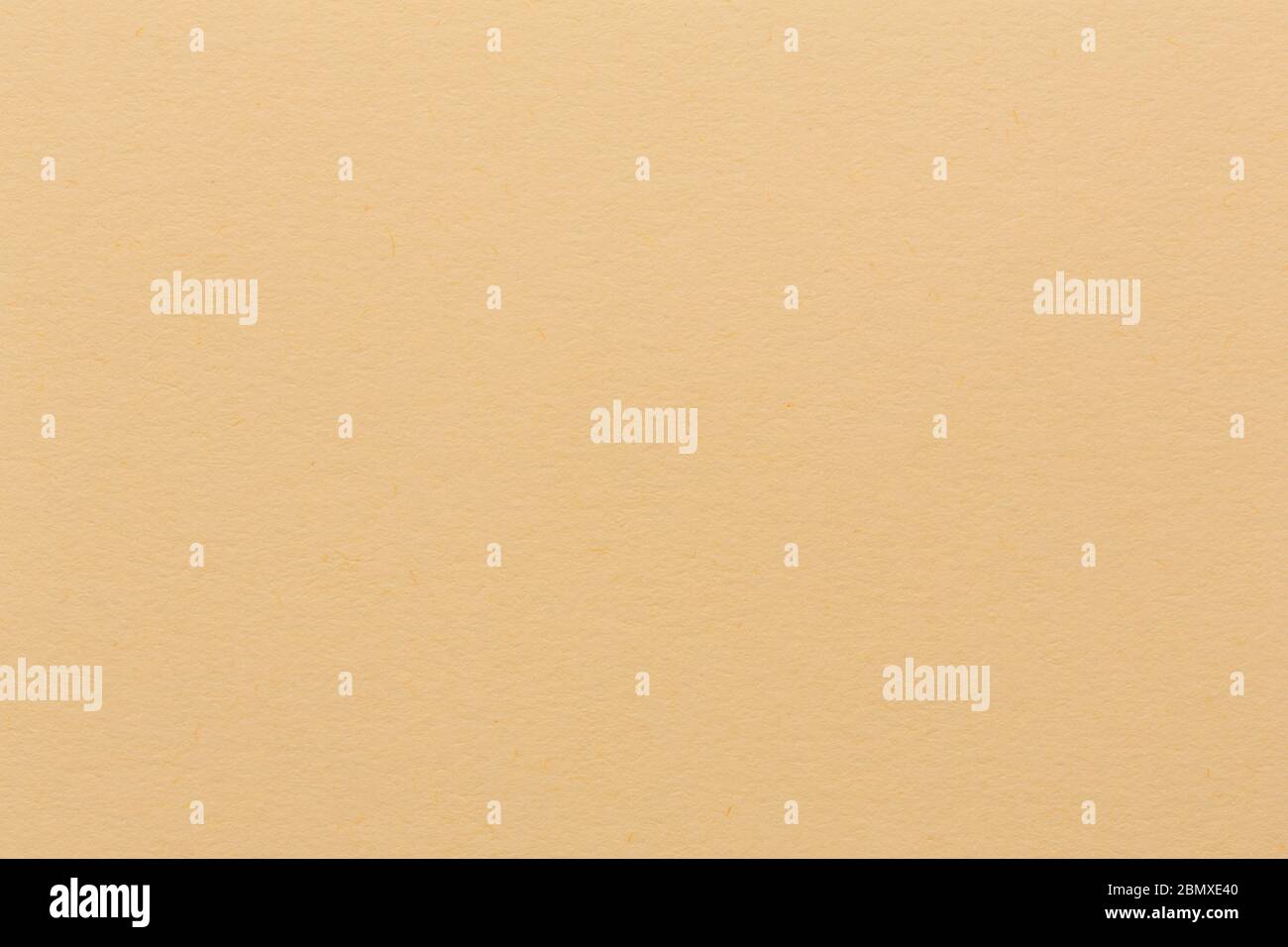 Light beige plain textureed paper on macro Stock Photo - Alamy