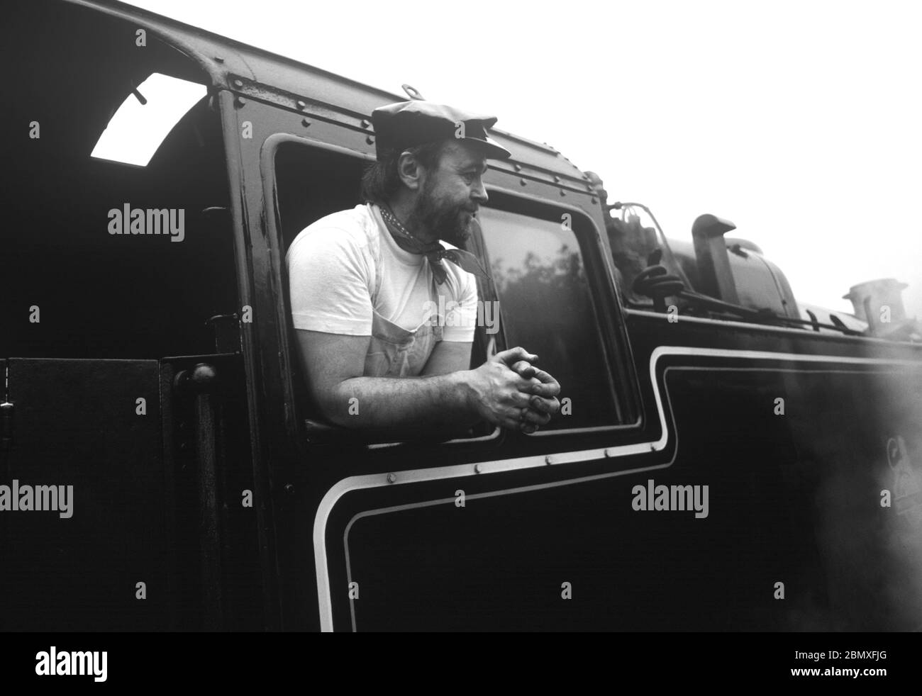 Steam locomotive driver on the Bluebell Heritage Railway, West Sussex ...