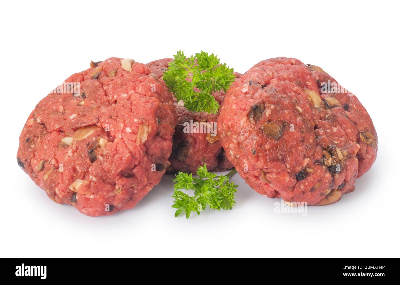 Studio shot of uncooked beef burger cut out against a white background ...