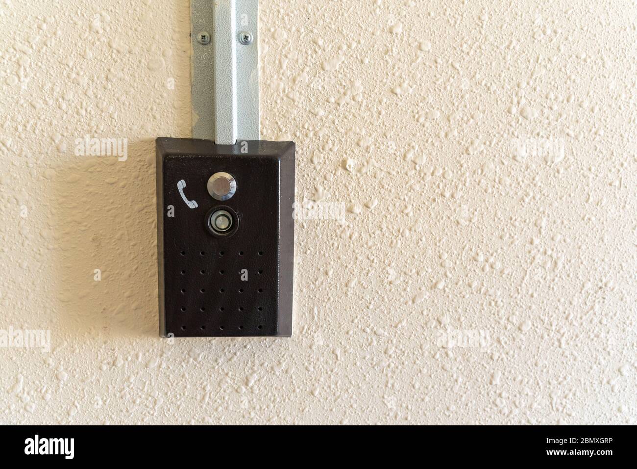 intercom. panel on the wall for calling the emergency service Stock ...