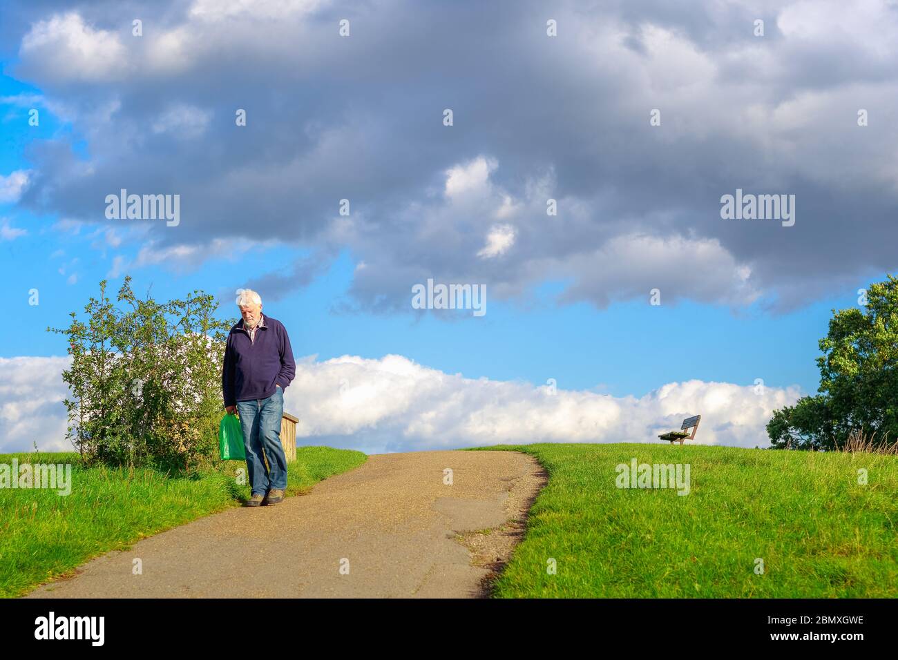 London, UK - October 5, 2019 - A senior man walking down from ...