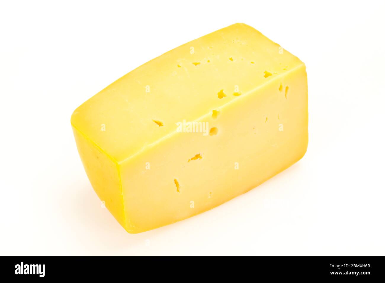 Swiss Hard yellow tasty cheese brick Stock Photo - Alamy