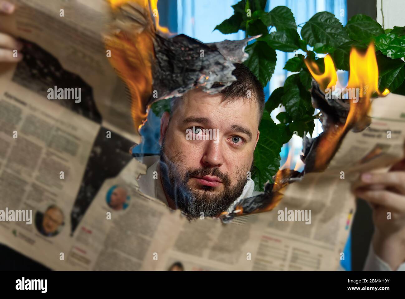 Burning broadsheet hi-res stock photography and images - Alamy