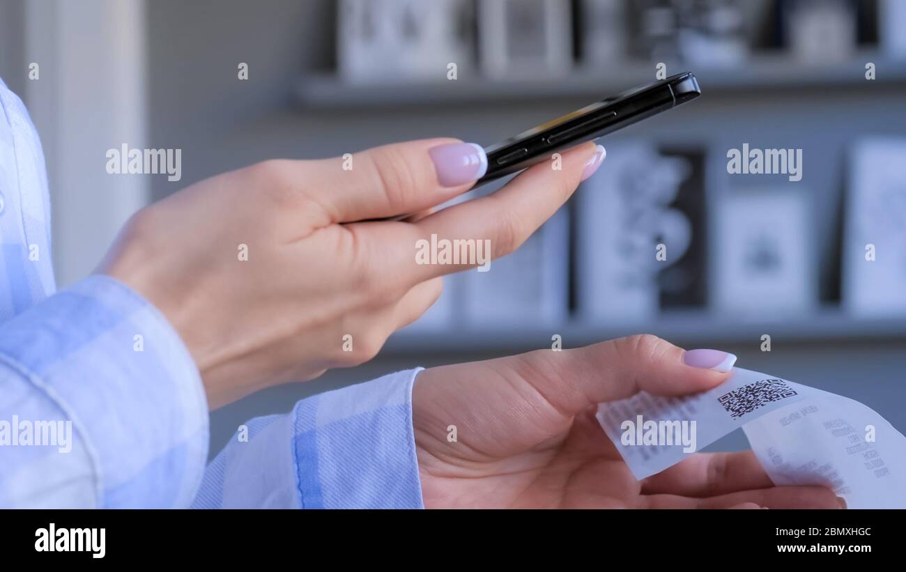 Scanning qr code from receipt hi-res stock photography and images - Alamy