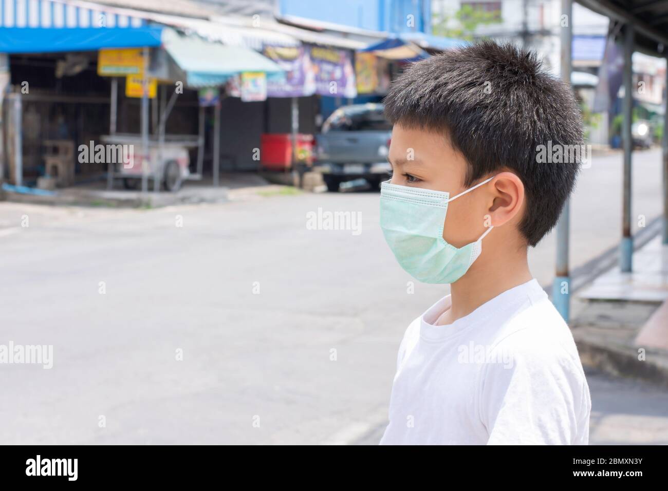 Boy wearing medical face mask hi-res stock photography and images - Alamy