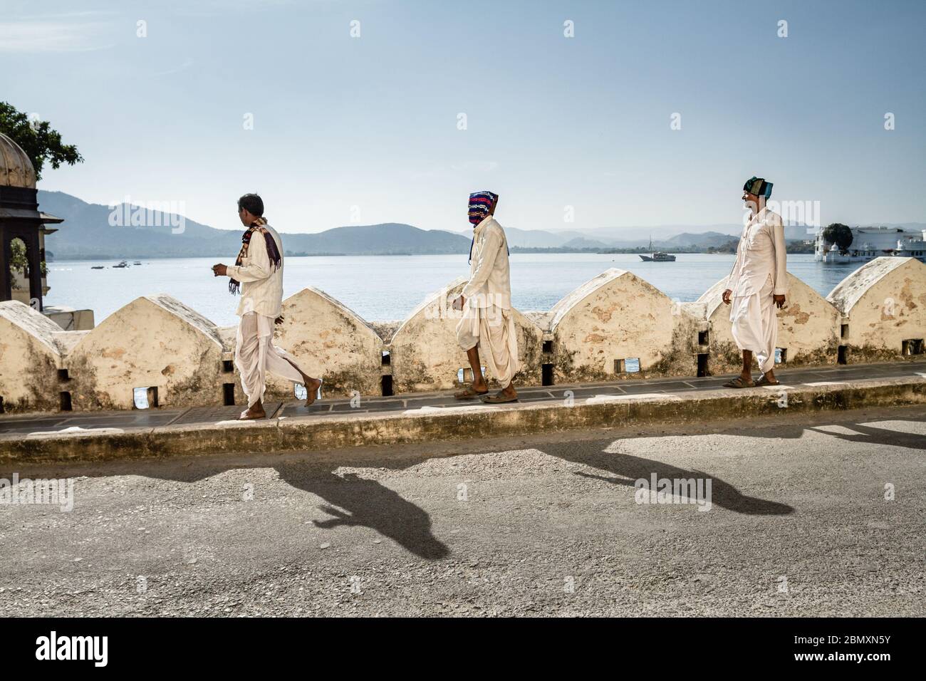 Udaipur, India - January 19th 2013. Three indian men dressed in white ...
