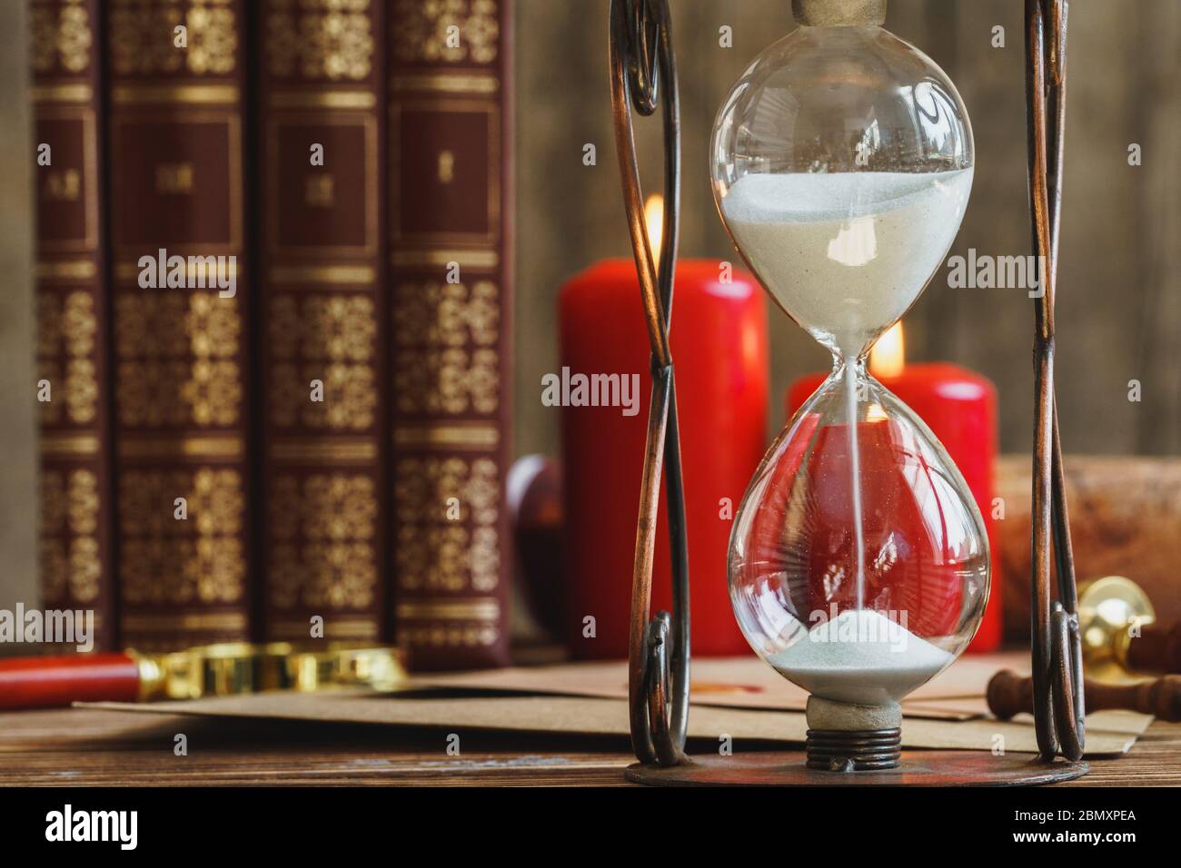Bible candle clock hi-res stock photography and images - Alamy