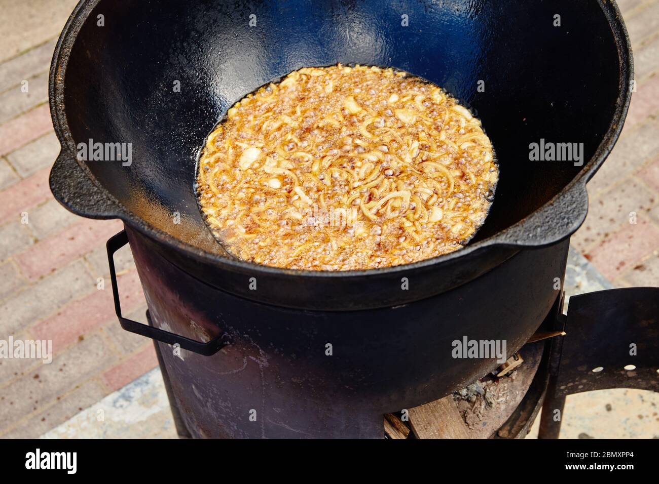 National Uzbek dish pilaf, pilaw, plov, rice with meat in big pan ...