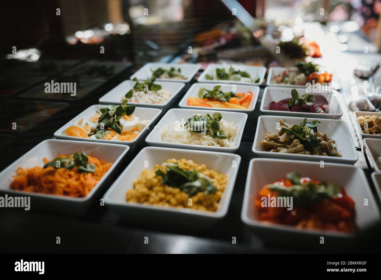 photo of an open buffet small plates Stock Photo - Alamy