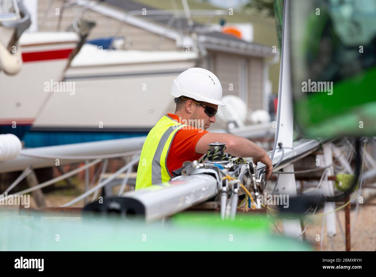 Staff working at UK boatyard Stock Photo - Alamy