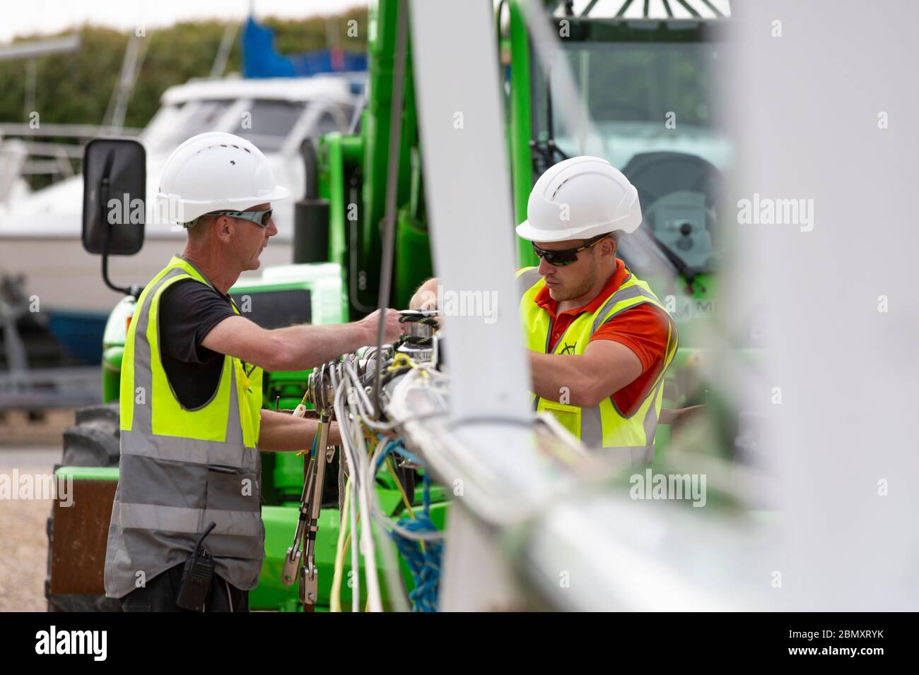 Staff working at UK boatyard Stock Photo - Alamy