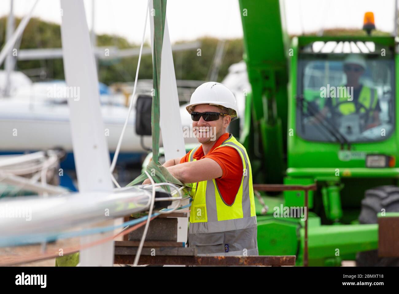 Staff working at UK boatyard Stock Photo - Alamy
