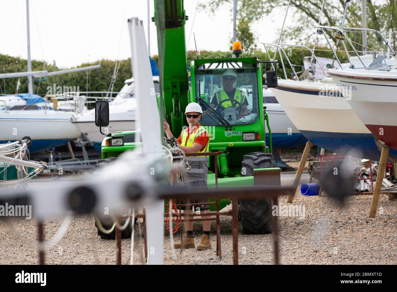 Staff working at UK boatyard Stock Photo - Alamy