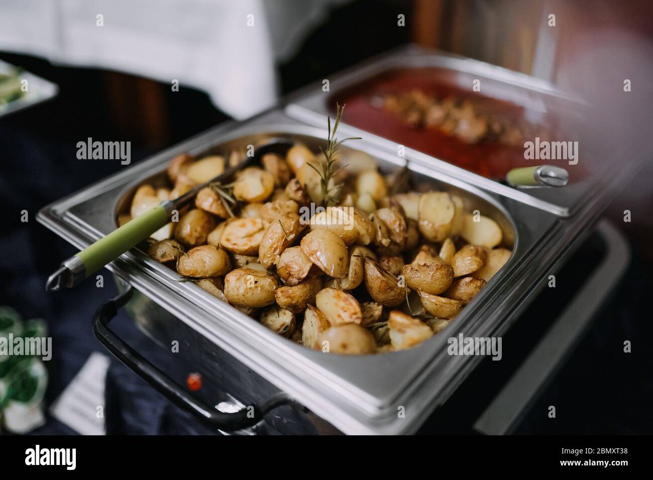 photo of potatoes in an open buffet Stock Photo - Alamy