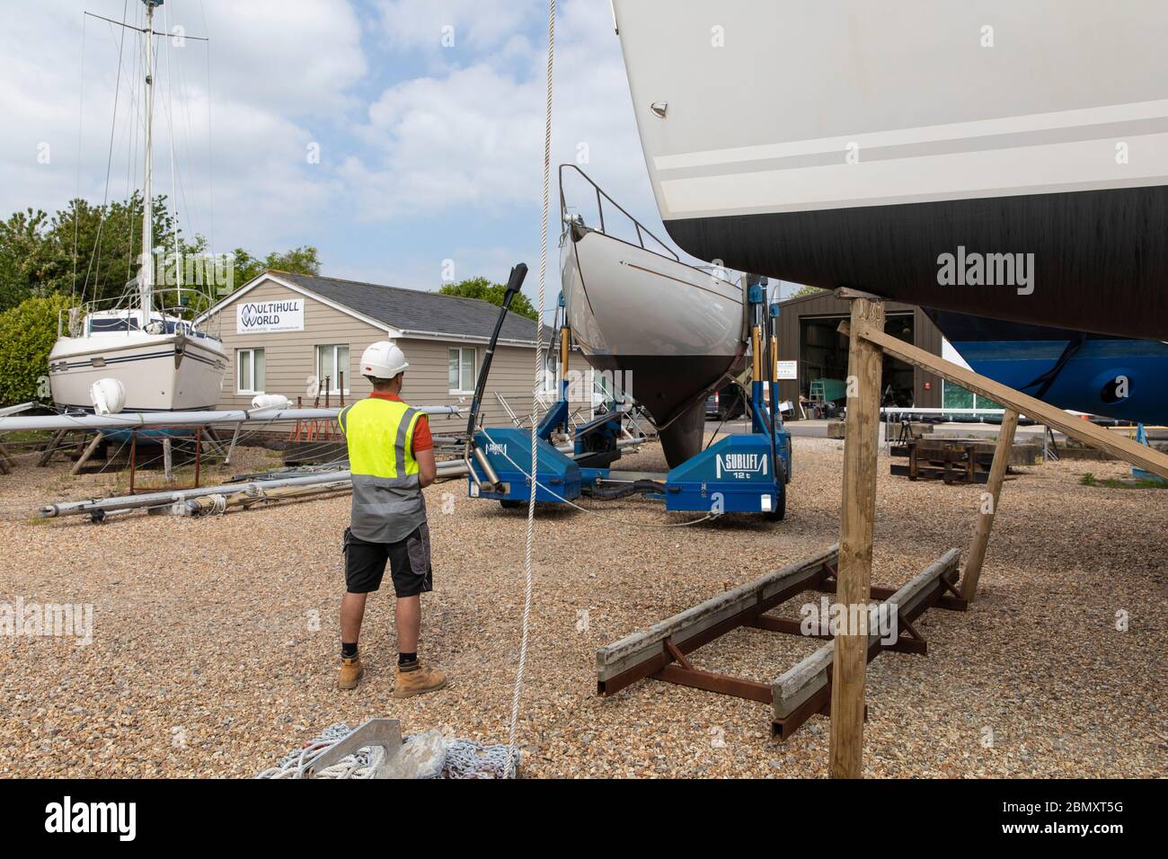 Staff working at UK boatyard Stock Photo - Alamy