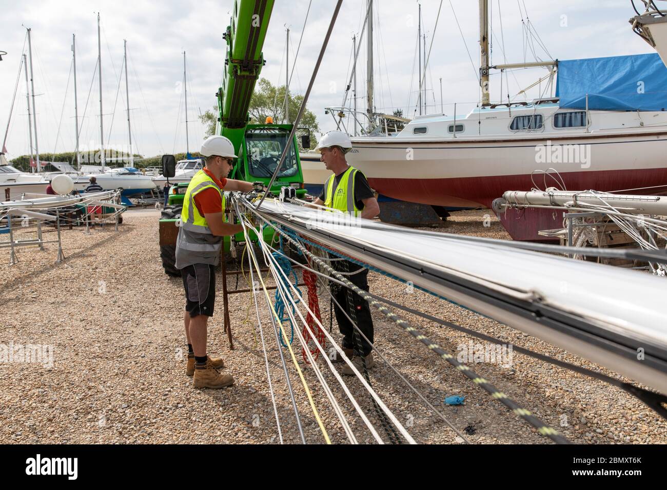 Staff working at UK boatyard Stock Photo - Alamy