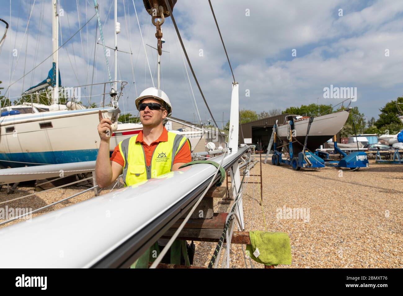Staff working at UK boatyard Stock Photo - Alamy