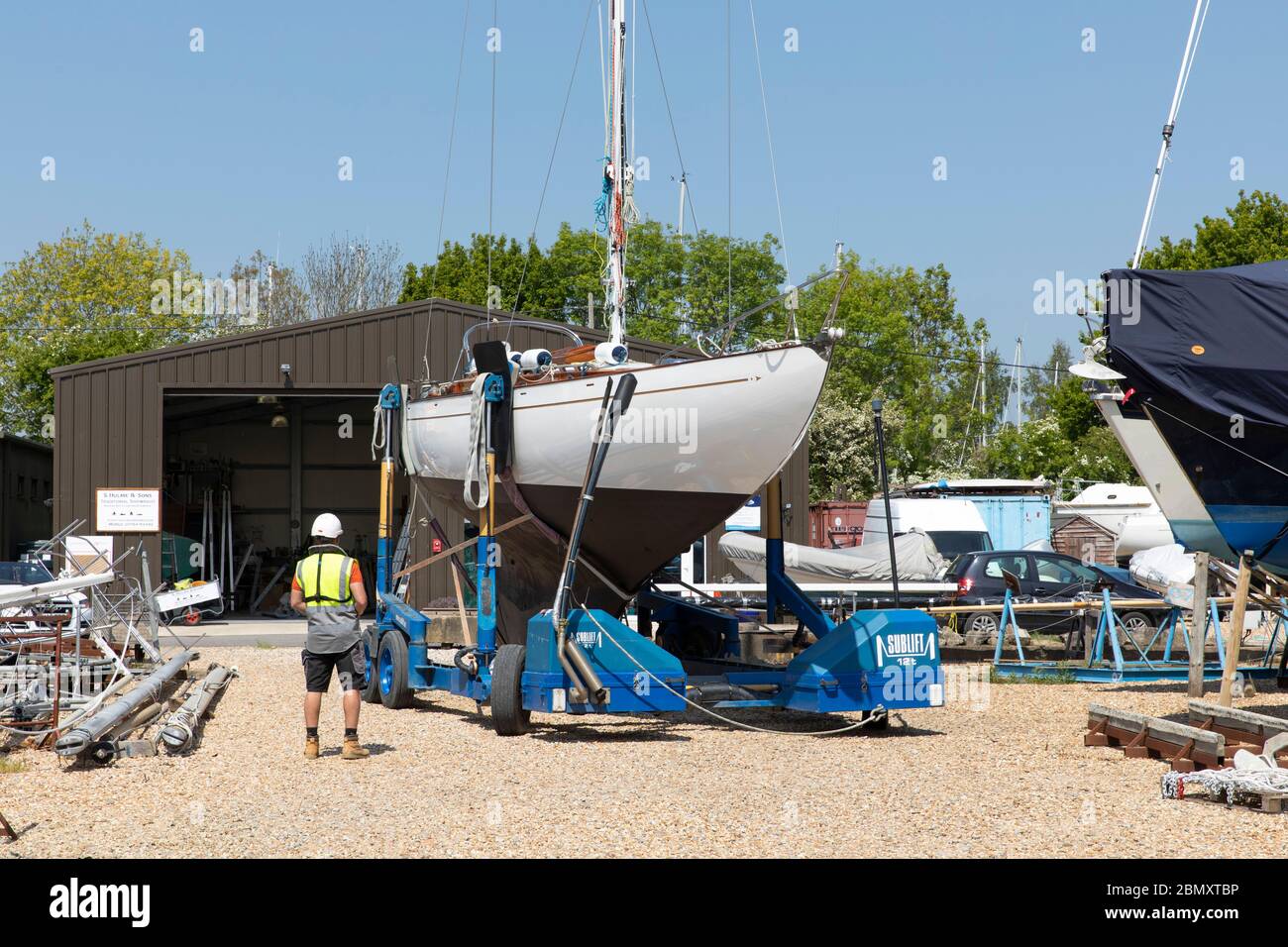 Staff working at UK boatyard Stock Photo - Alamy