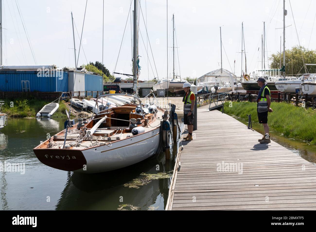 Staff working at UK boatyard Stock Photo - Alamy
