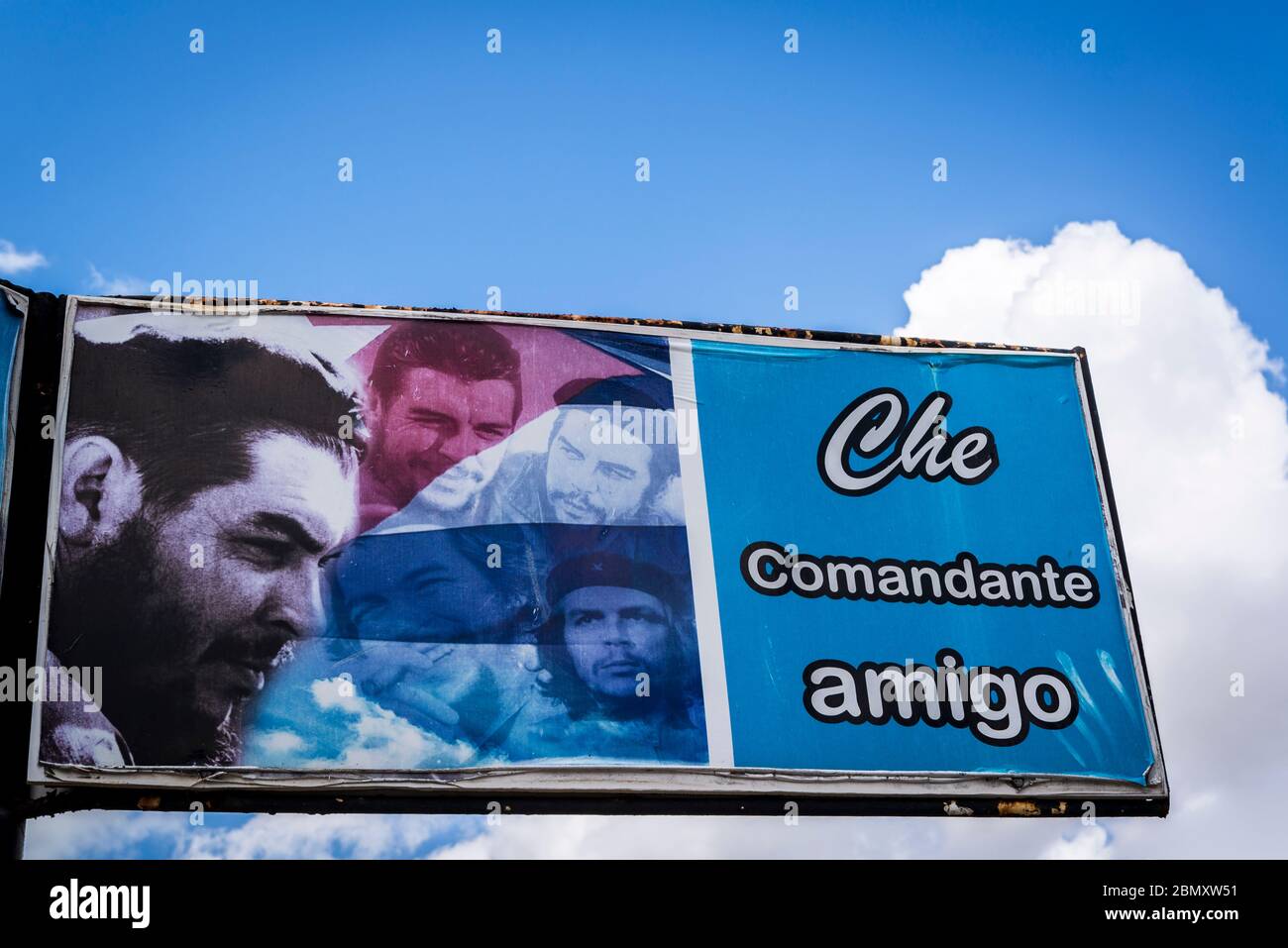 Political slogan on a street sign with Che Guevara picture saying: Che ...