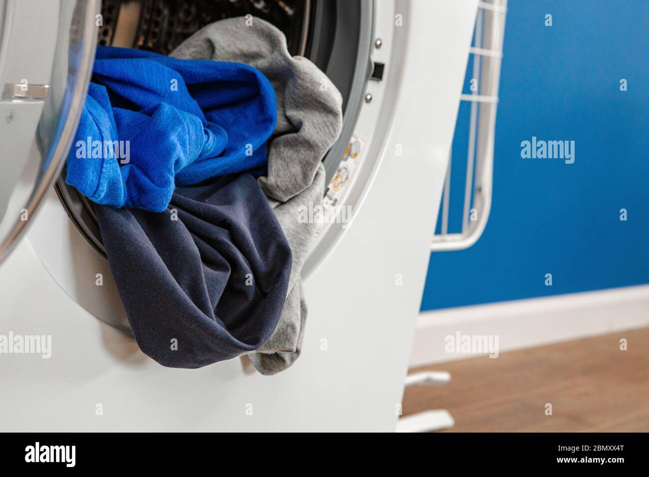 Laundry room. Close up of washing machine Stock Photo - Alamy
